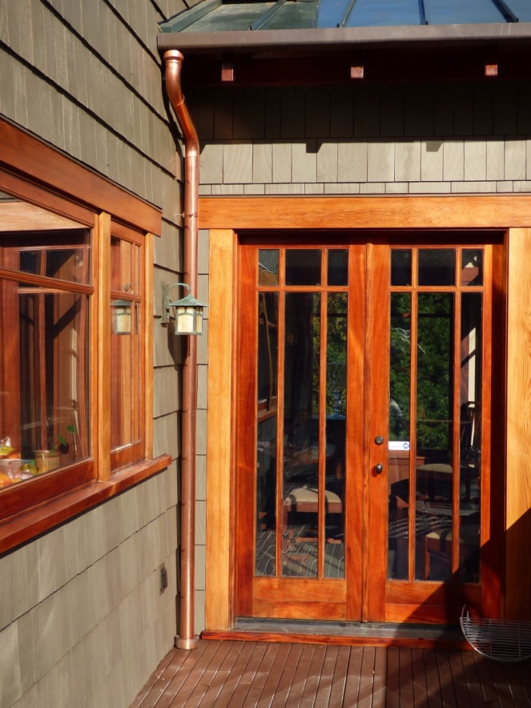 Copper Downspouts & Beam Caps on Greene & Greene Home in Seattle